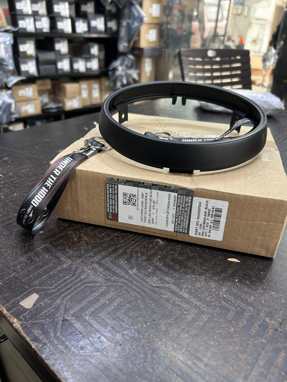 RAN00976/A LED Headlamp Rim Black – RE Scram 440 OEM – UNDER THE HOOD